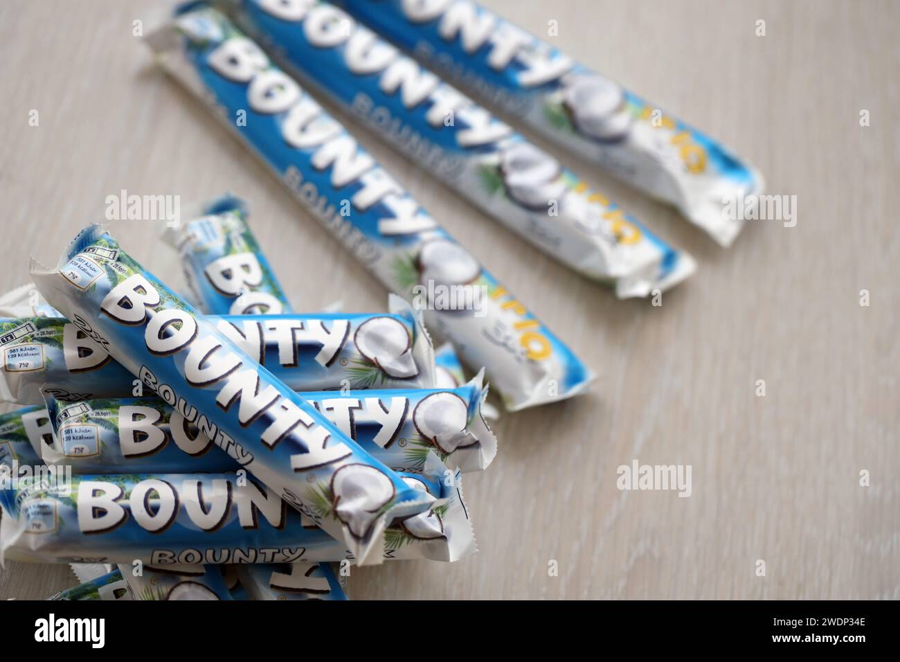 KYIV, UKRAINE - OCTOBER 31, 2023 Bounty chocolate bars with cocoa ...