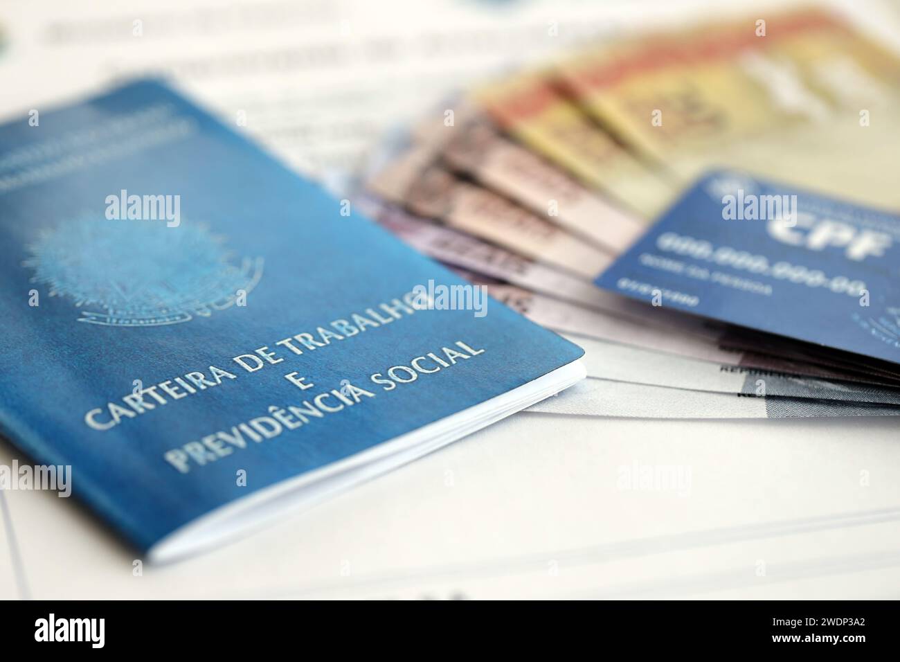 TERNOPIL, UKRAINE - JULY 7, 2023 Brazilian Work Permit document and ...