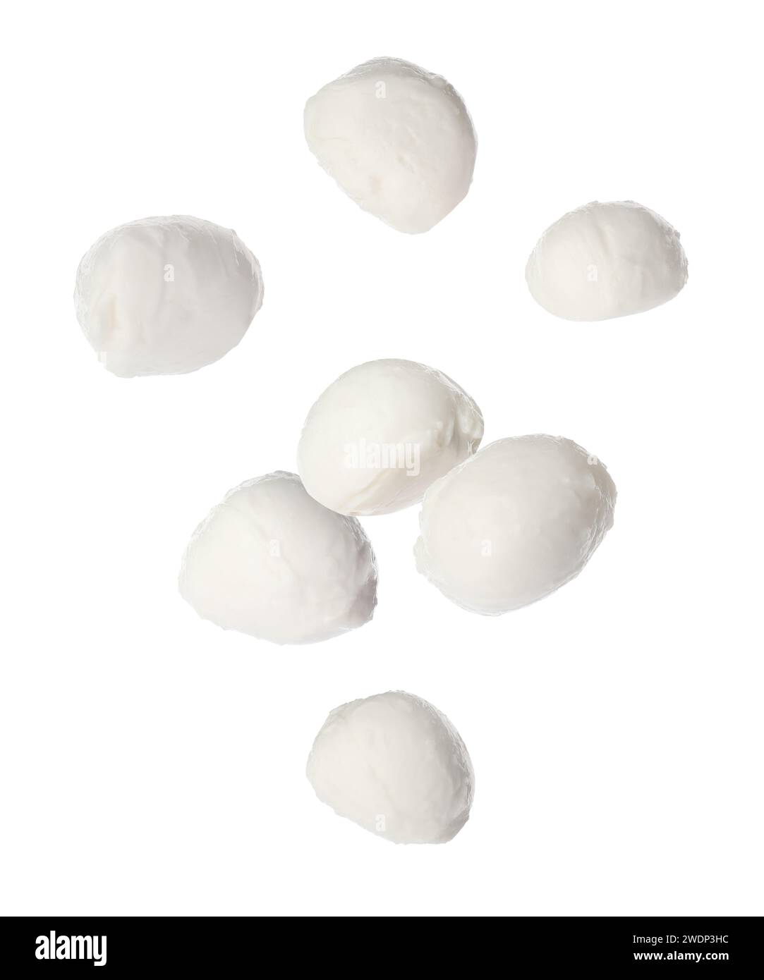 Fresh mozzarella balls falling on white background Stock Photo - Alamy