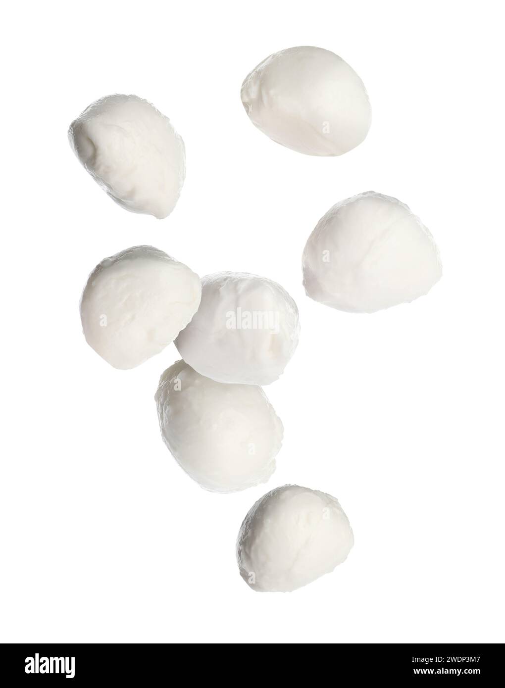 Fresh mozzarella balls falling on white background Stock Photo - Alamy