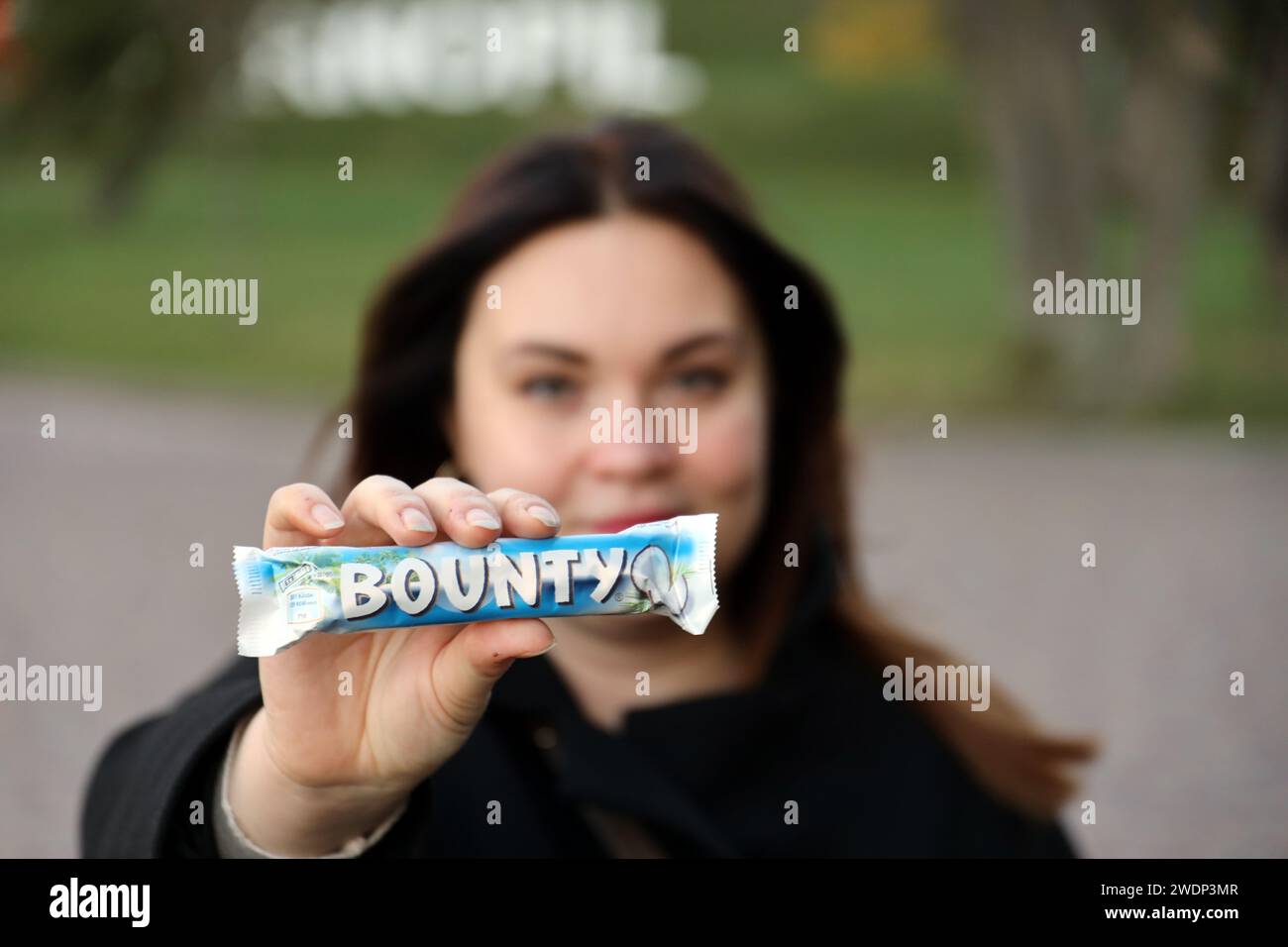 KYIV, UKRAINE - OCTOBER 31, 2023 Bounty chocolate bars with cocoa ...