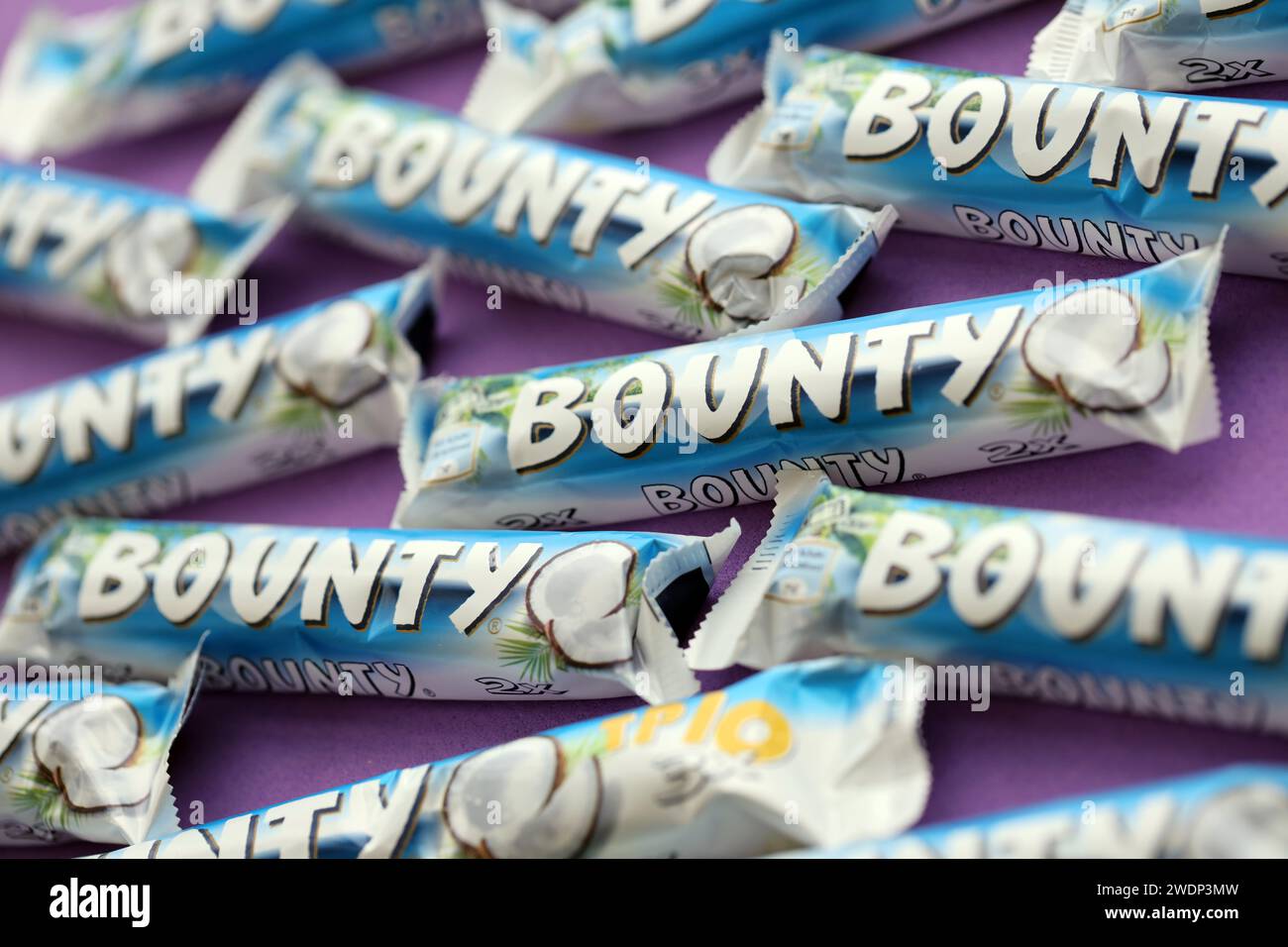 KYIV, UKRAINE - OCTOBER 31, 2023 Bounty chocolate bars with cocoa ...
