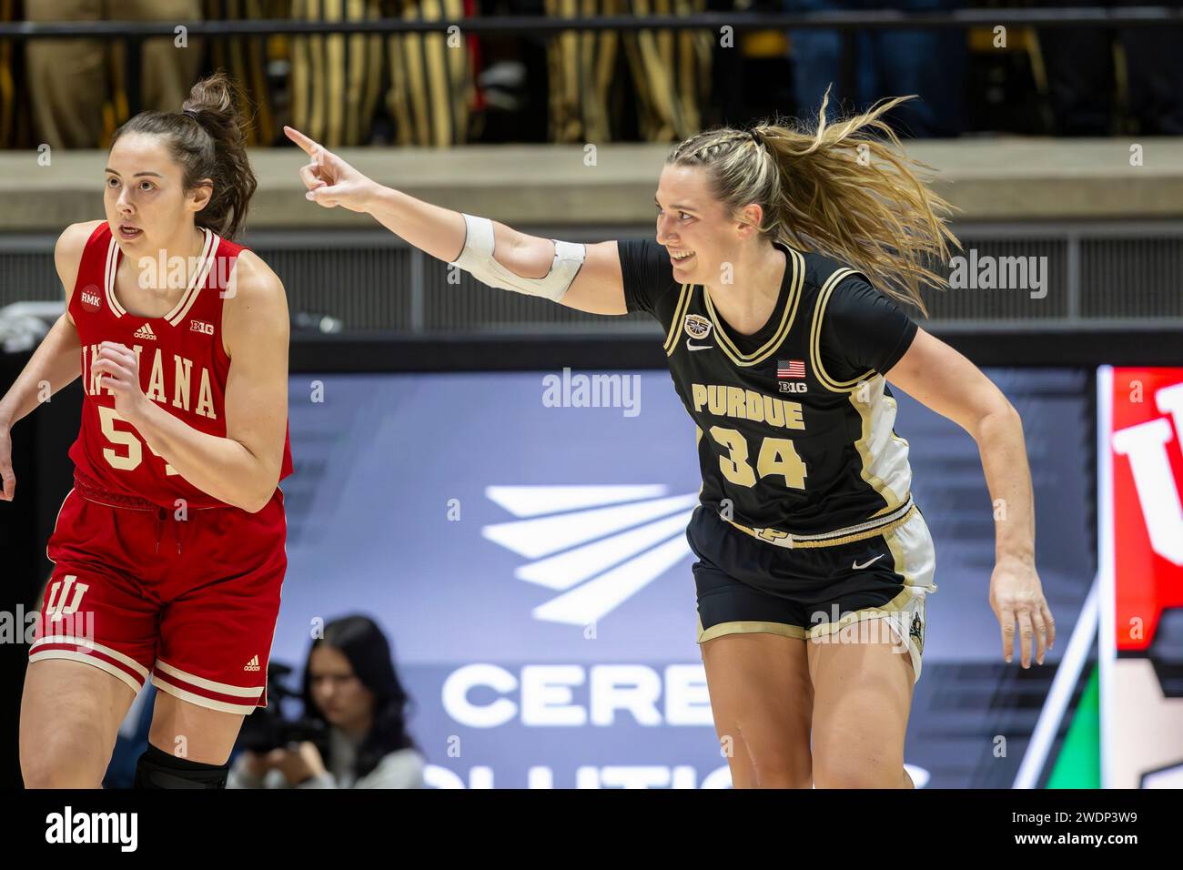 Purdue forward Caitlyn Harper (34) reacts after scoring during an NCAA ...