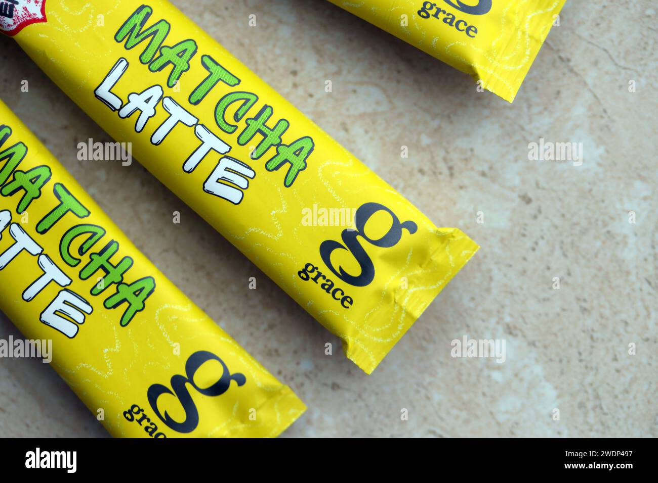 KYIV, UKRAINE - OCTOBER 31, 2023 Matcha Latte yellow sticks of green ...