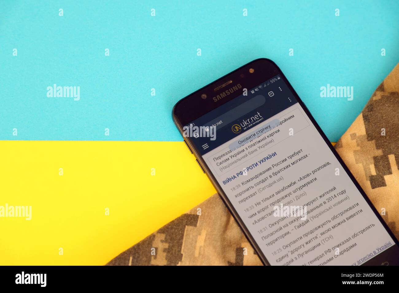 KYIV, UKRAINE - 4 MAY, 2023: Ukr Net ukrainian news portal on smartphone screen with ukrainian ...