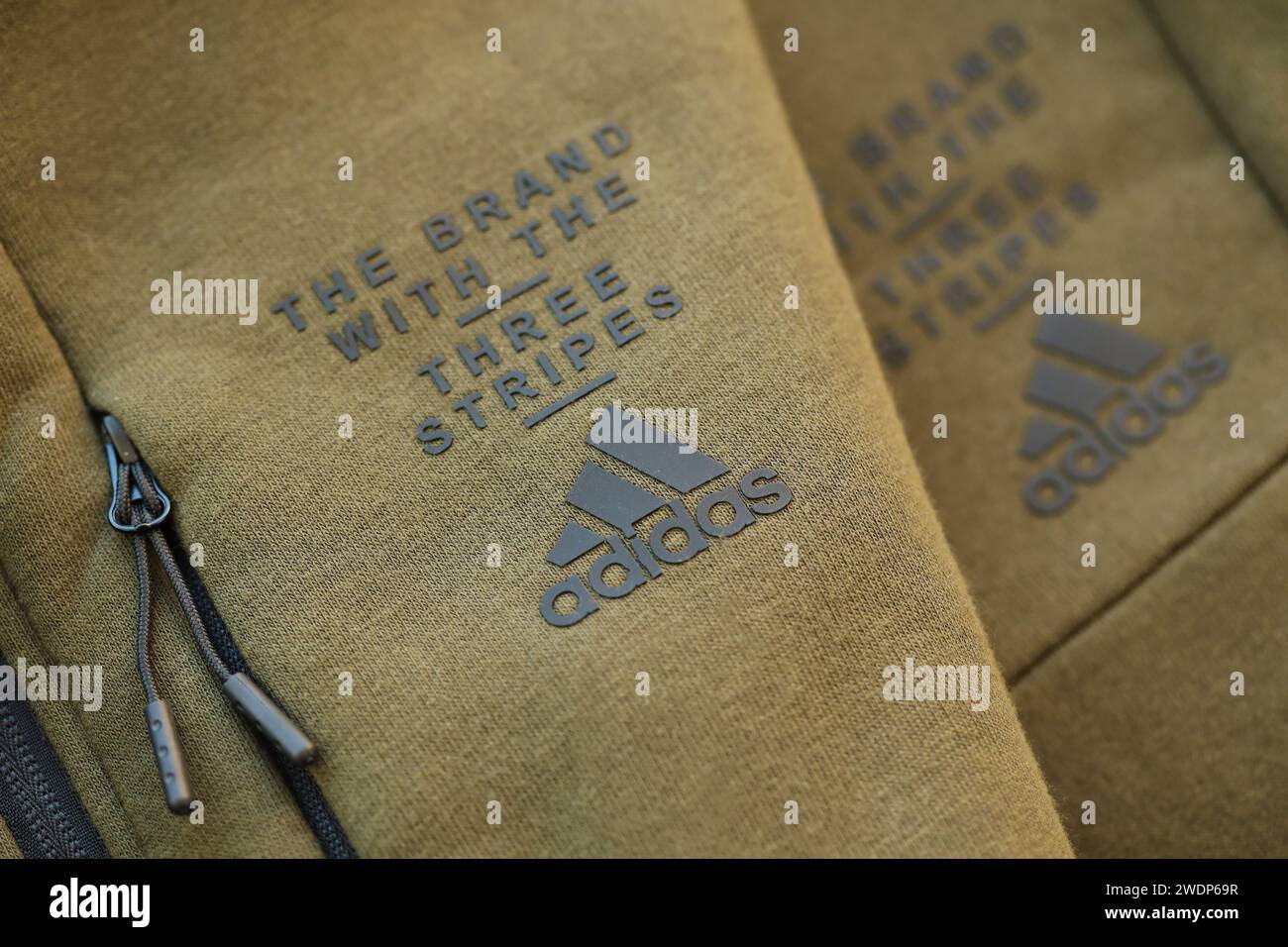 KYIV, UKRAINE - 4 MAY, 2023: Adidas company logo on new brand clothes ...