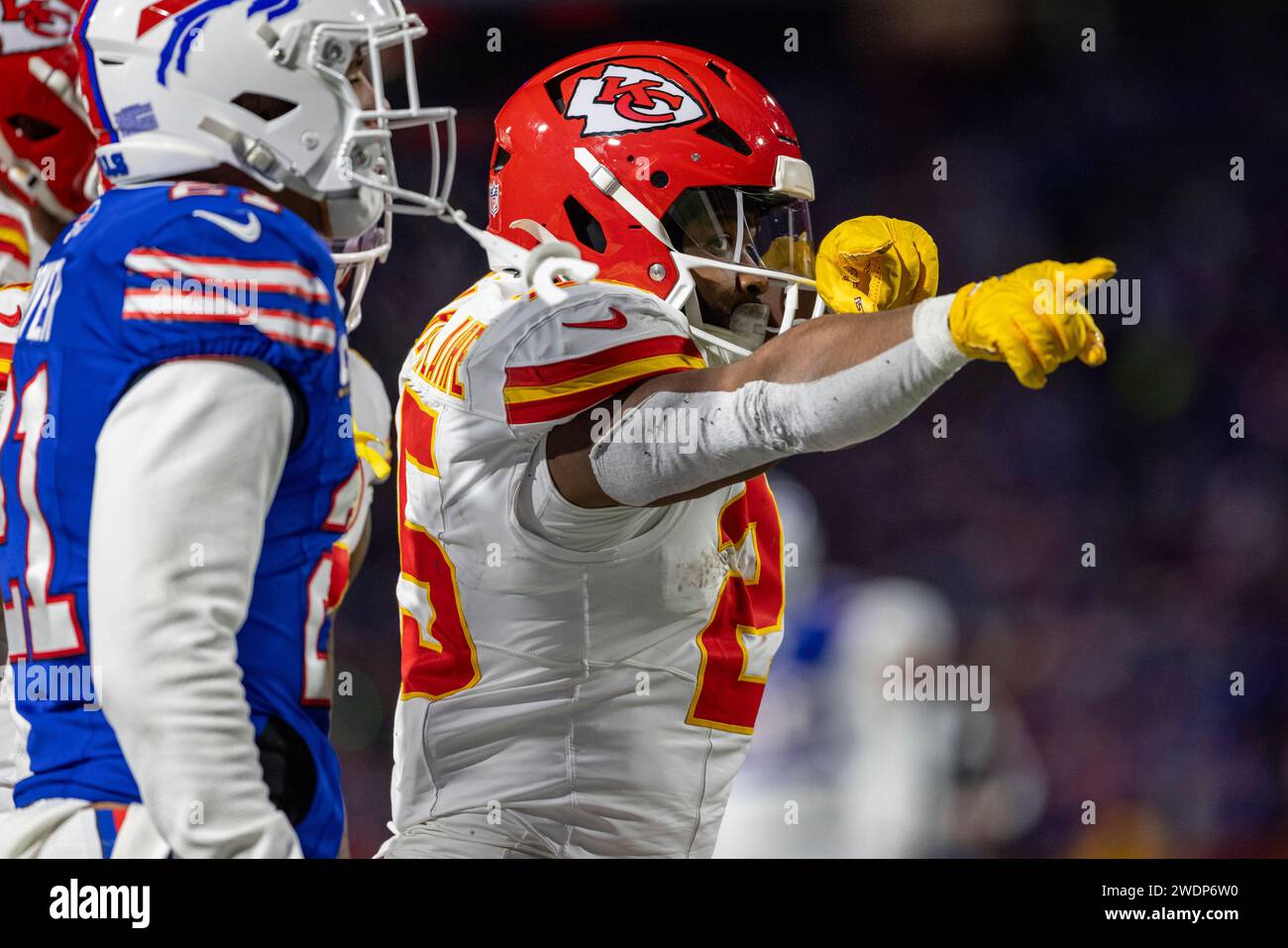 Kansas City Chiefs running back Clyde Edwards-Helaire (25) signals for ...