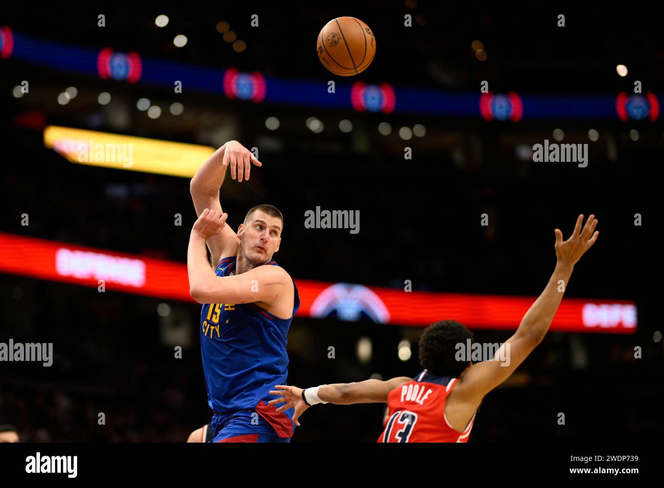 Denver Nuggets center Nikola Jokic (15) passes the ball against ...