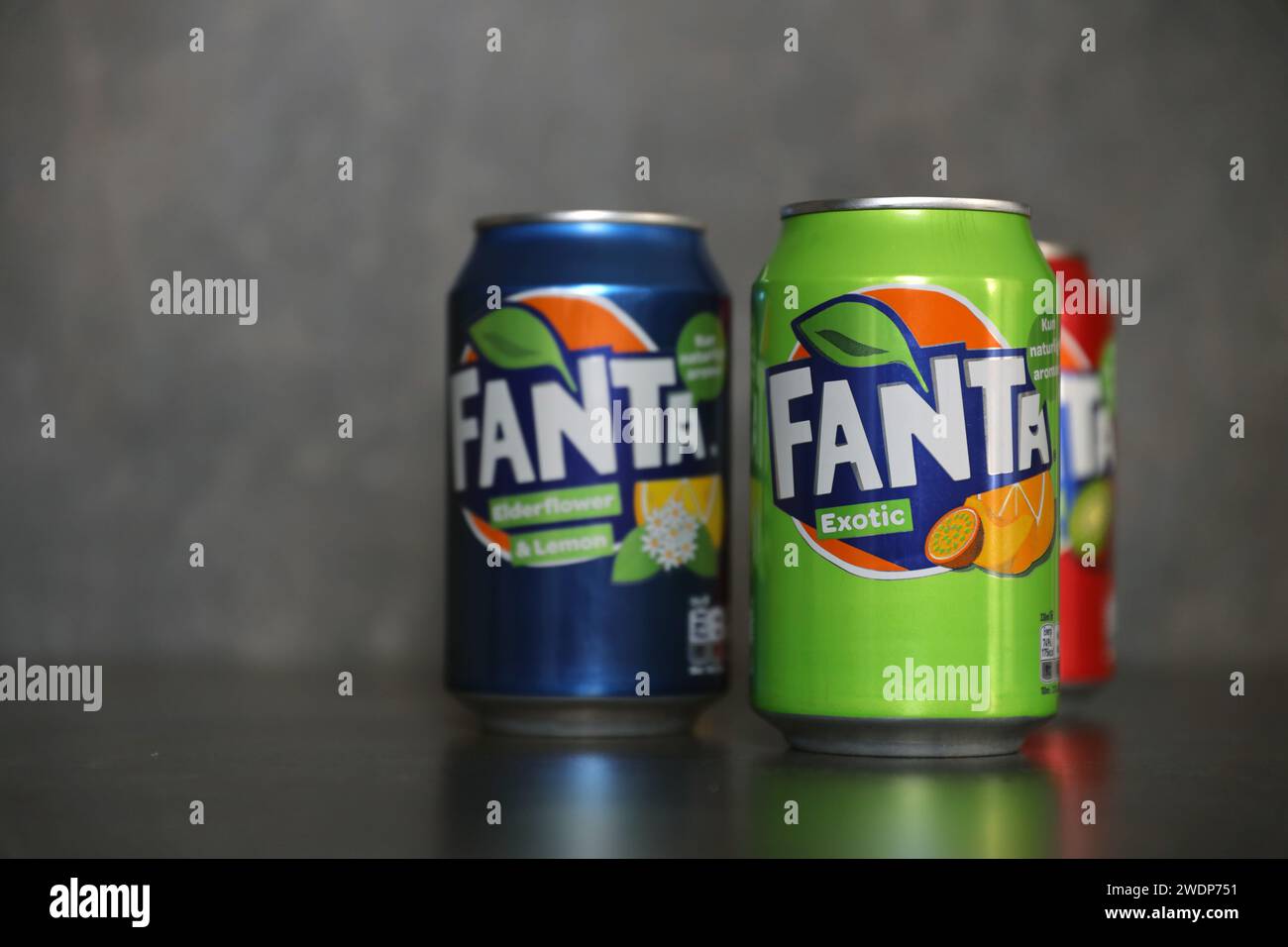 KYIV, UKRAINE - 4 MAY, 2023: Fanta soft drink brand tin cans with ...