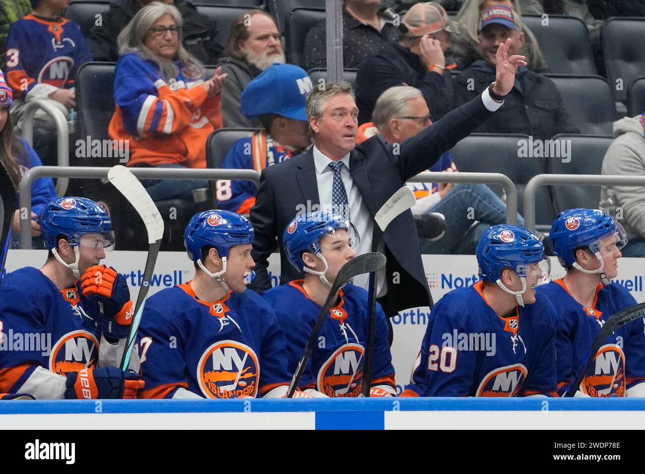 New York Islanders' head coach Patrick Roy watches the game action ...