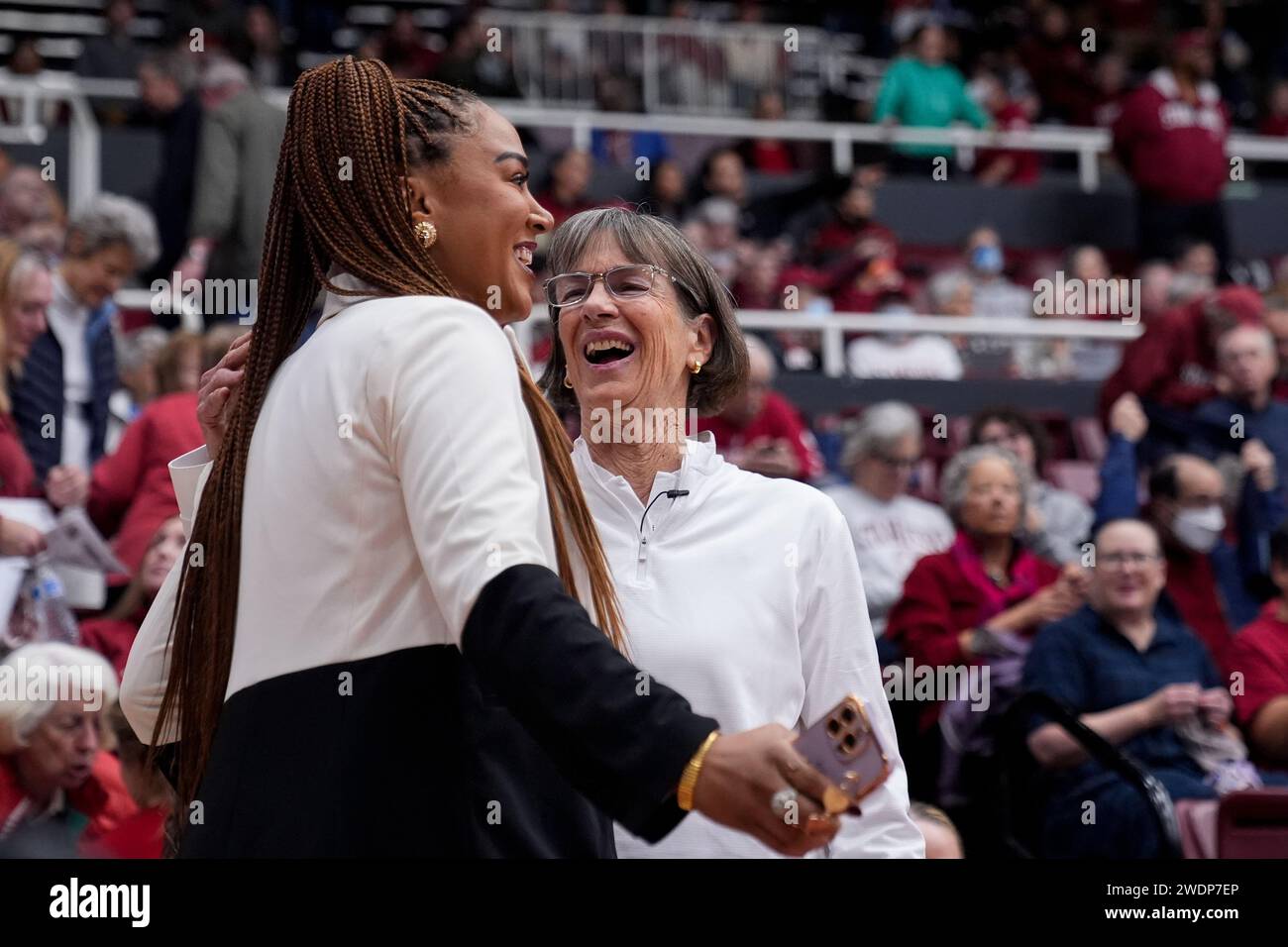 Stanford head coach Tara VanDerveer, right, speaks with former player ...