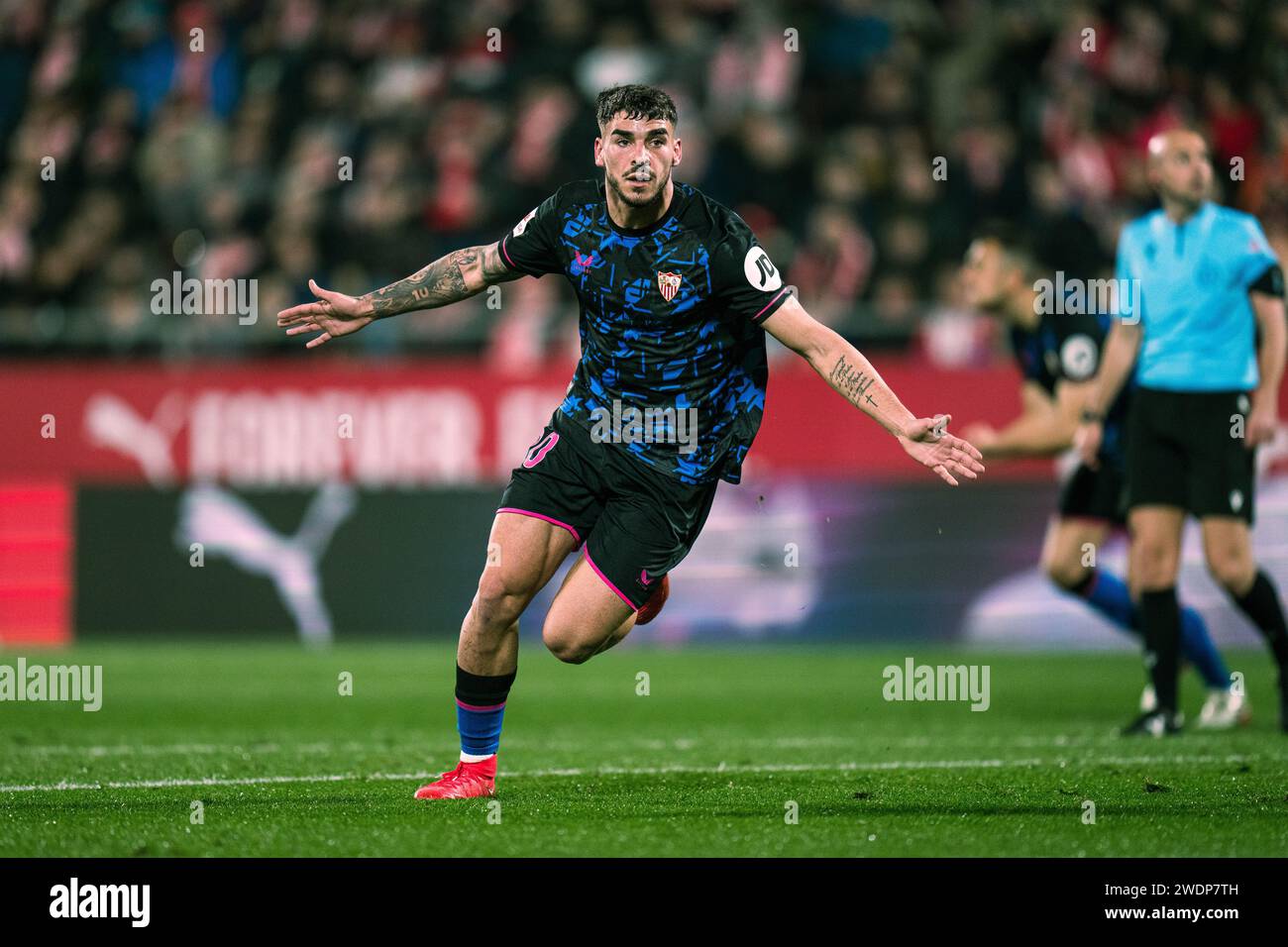 Girona, Spain. 21st Jan, 2024. Isaac Romero of Sevilla celebrates a ...