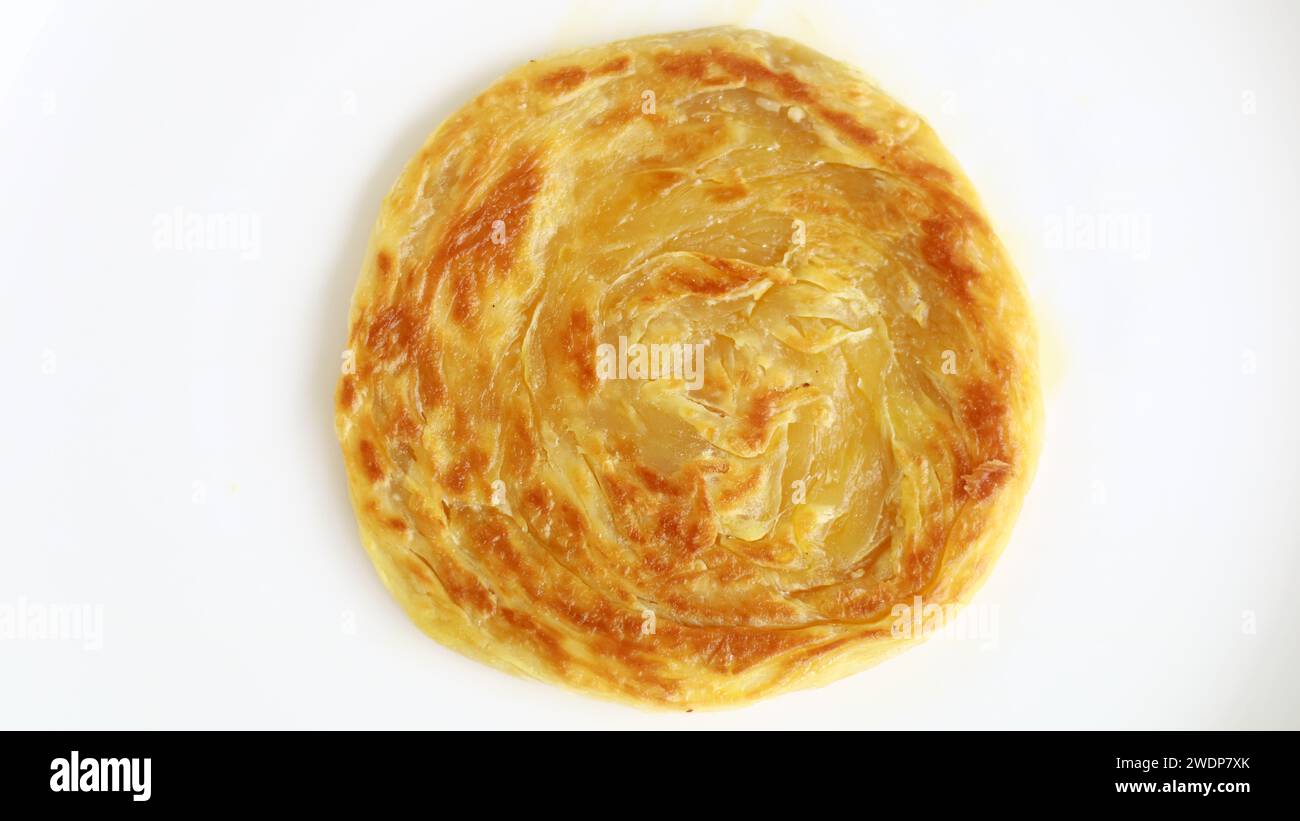 Roti Canai or Roti Paratha on white background Stock Photo - Alamy