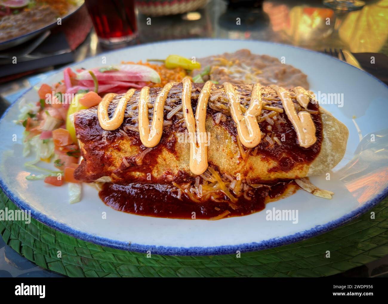 A pollo asado burrito at a San Diego, California restaurant Stock Photo ...
