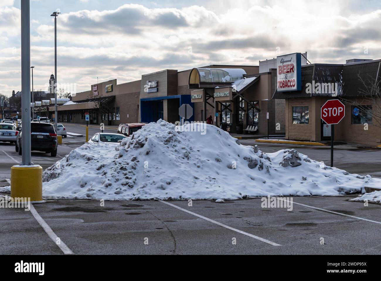A large pile of cleared snow in the Edgewood Towne Centre shopping ...
