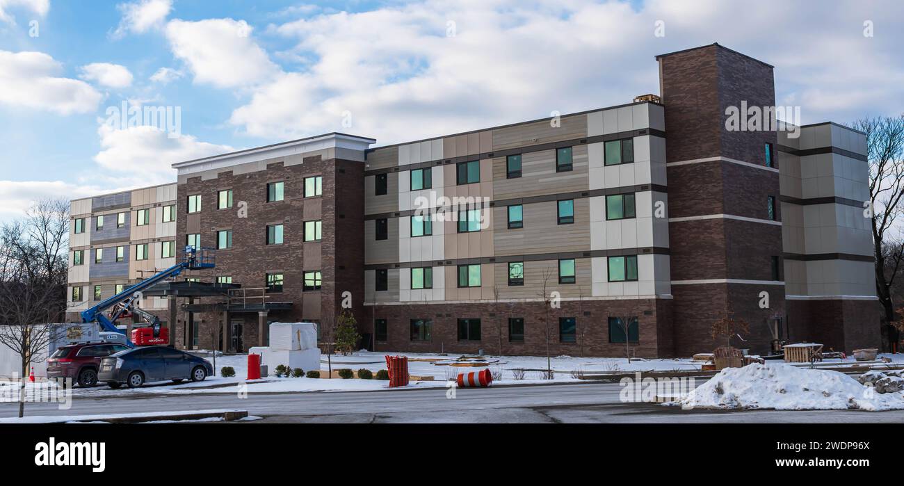 A apartment building under construction in the Edgewood Towne Centre ...