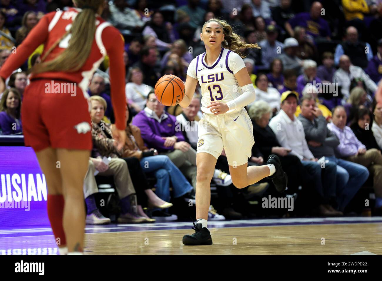 Baton Rouge, LA, USA. 21st Jan, 2024. LSU's Last-Tear Poa (13) brings ...
