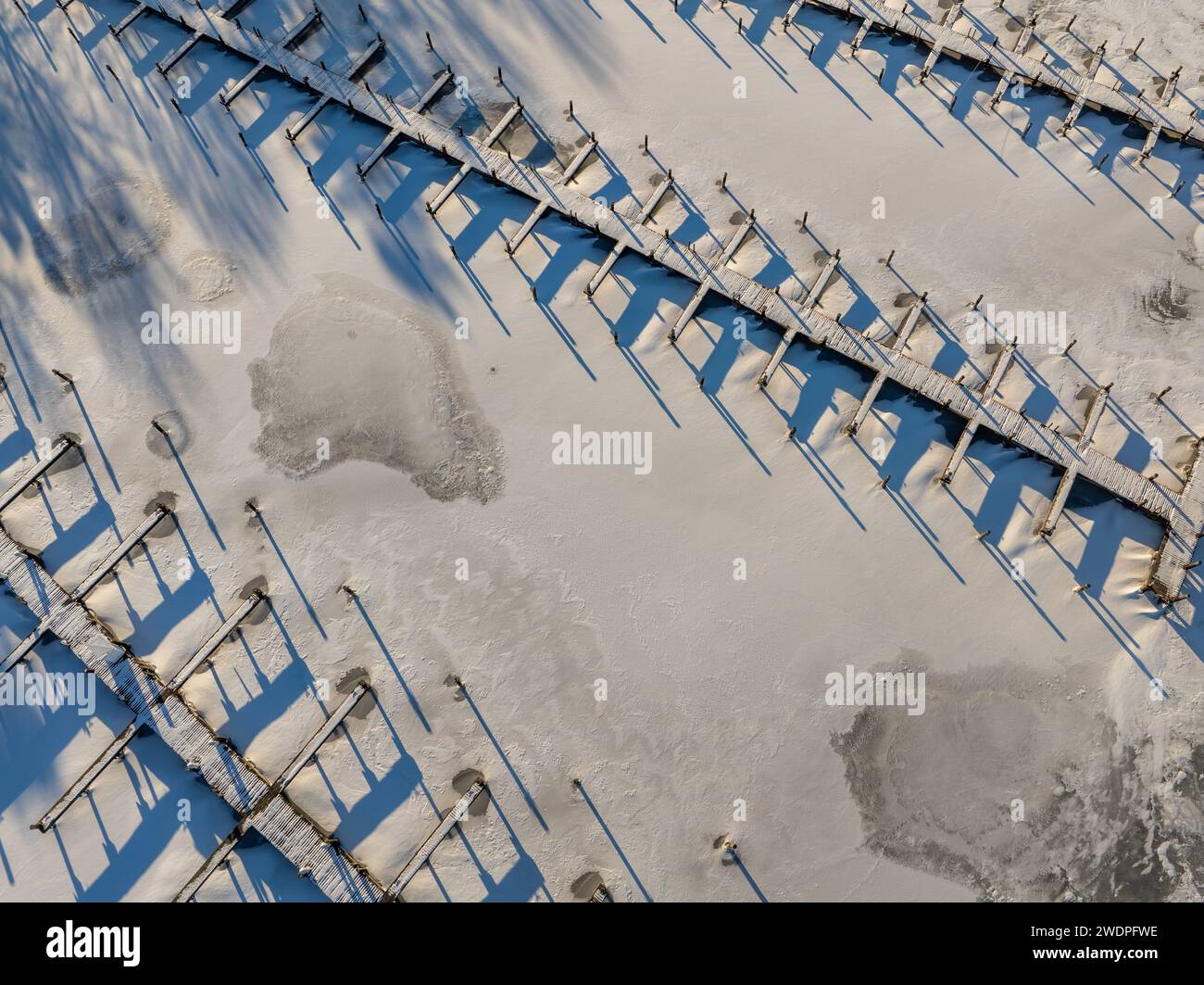 Winter aerial photo of frozen, snowy marina, docks at Allan H Treman ...