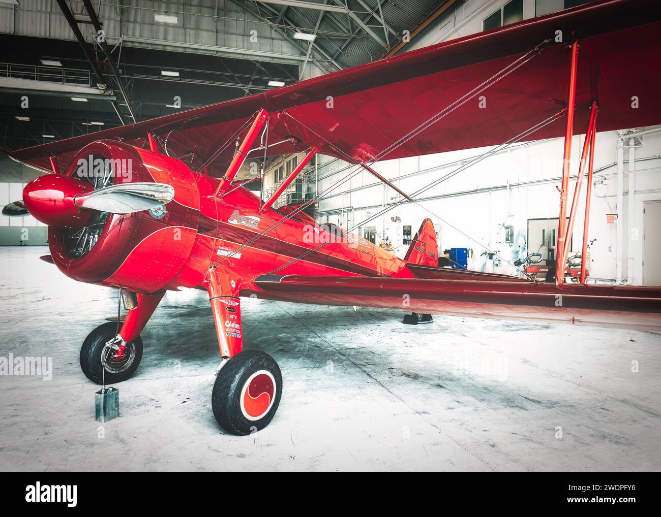 Air show legend Vicky Benzing's Stearman biplane sits in a hangar at ...