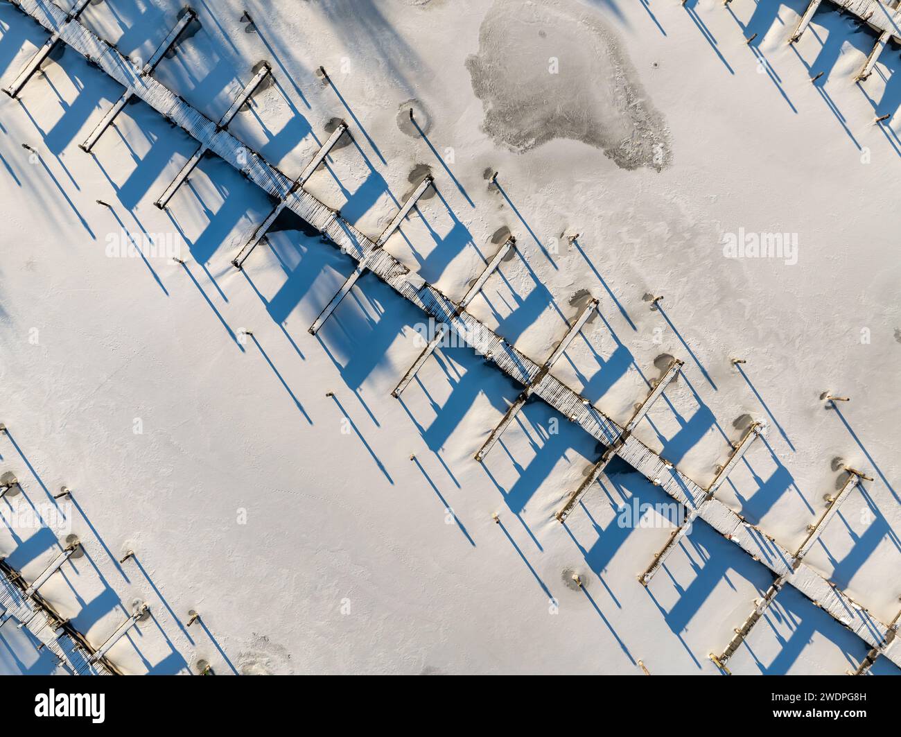 Winter aerial photo of frozen, snowy marina, docks at Allan H Treman ...