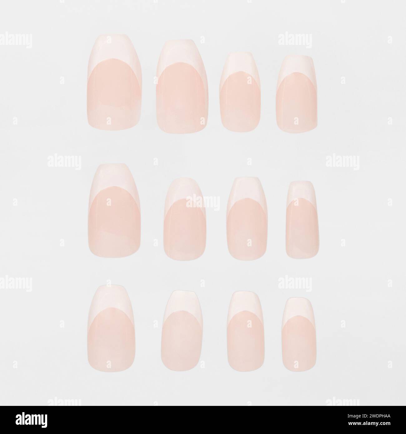 realistic set of colored false nails adhesive isolated on white ...