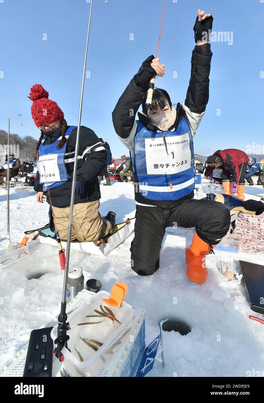 Participants compete during the Abashiri Lake Smelt Fishing ...