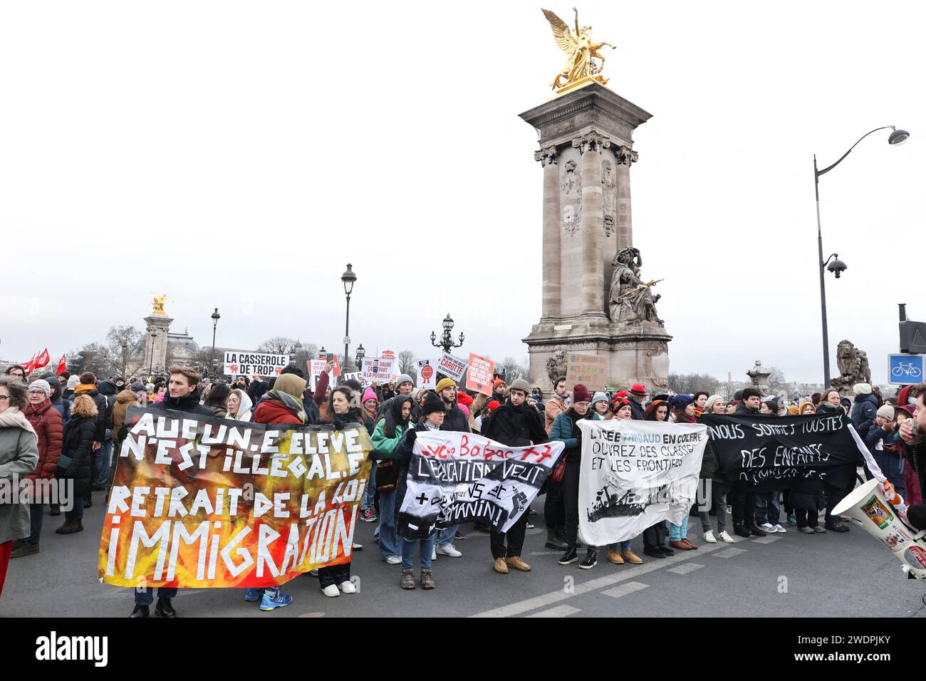 Paris, France. 21st Jan, 2024. Demonstrators holding placards and ...