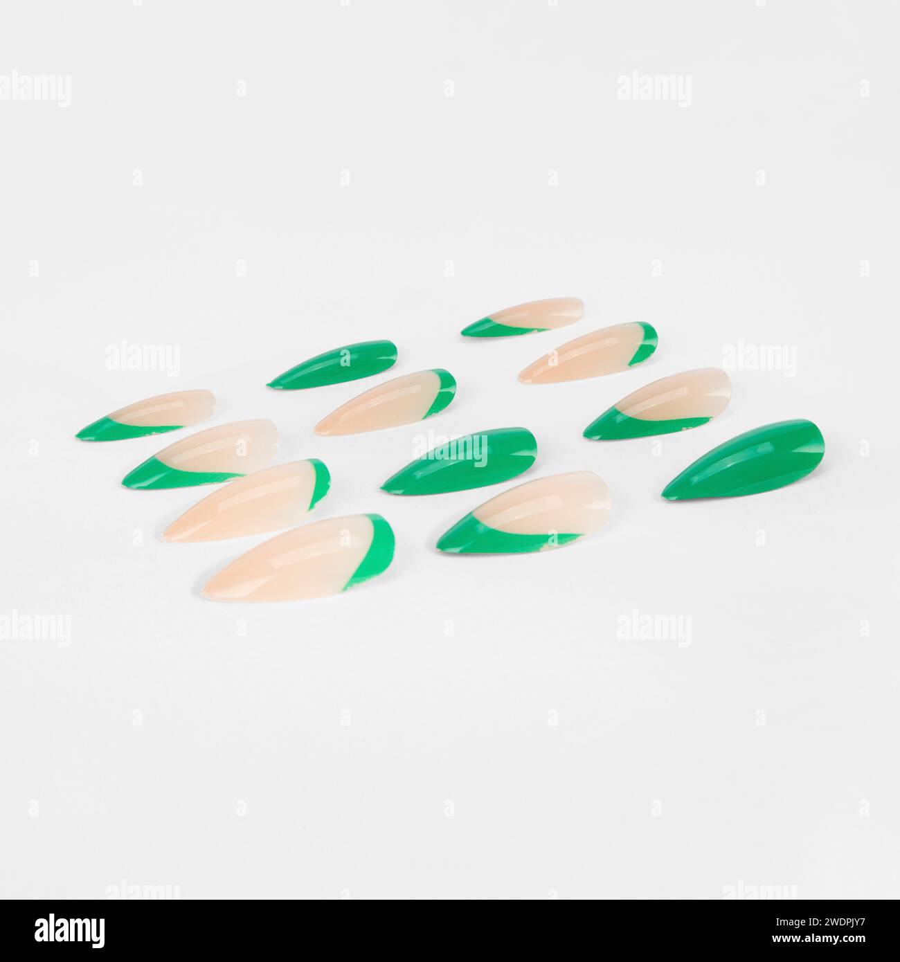 realistic set of colored false nails adhesive isolated on white ...