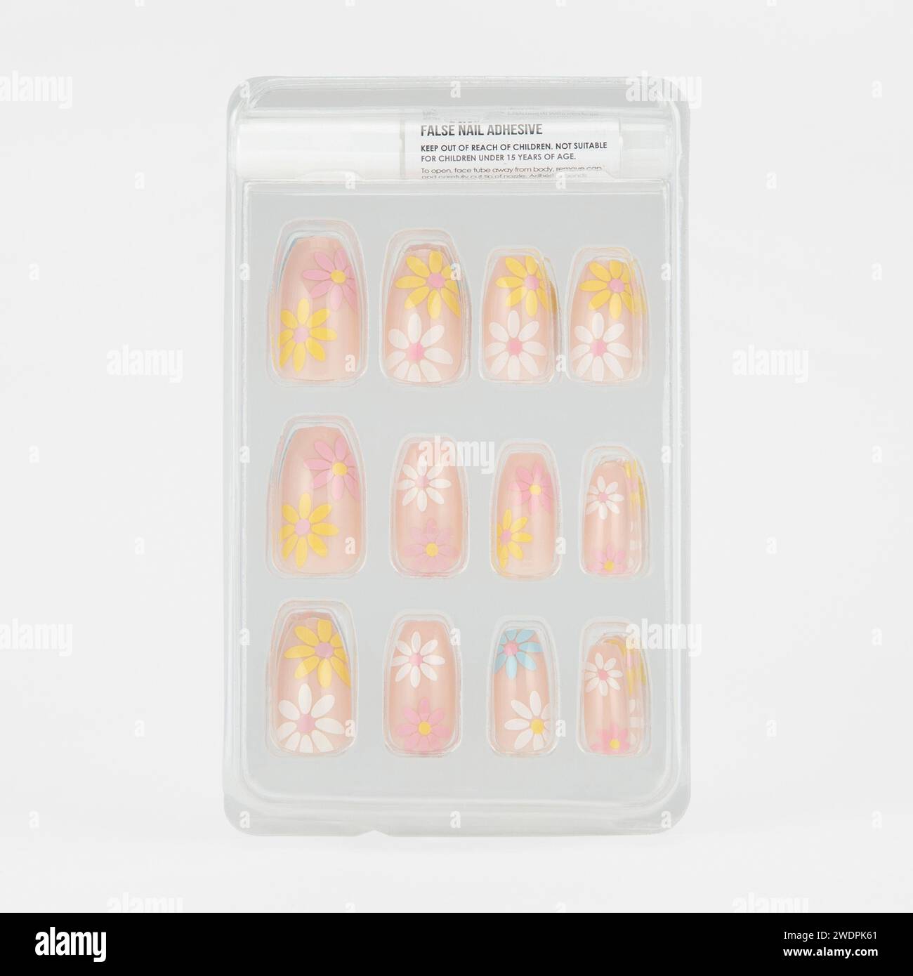 realistic set of colored false nails adhesive isolated on white ...