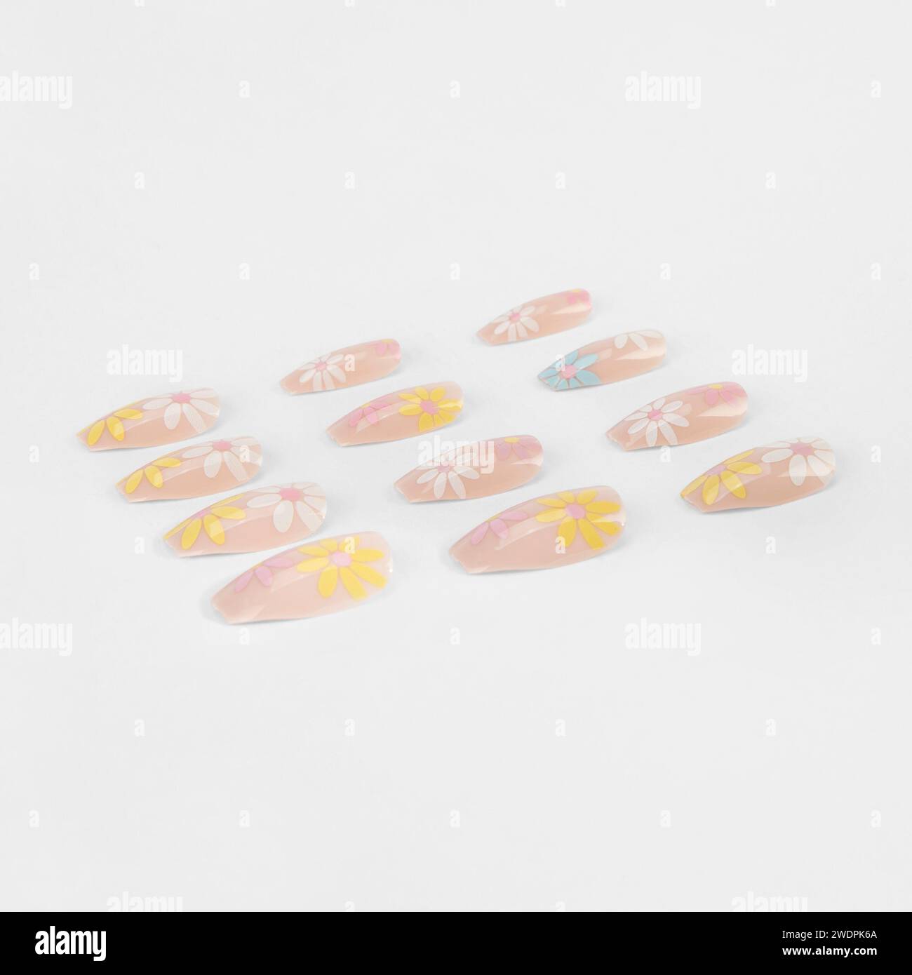 realistic set of colored false nails adhesive isolated on white ...