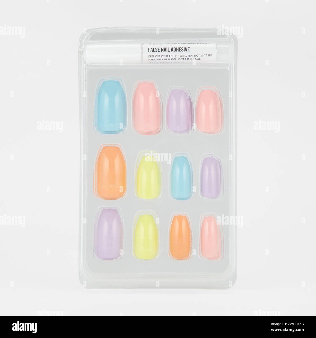 realistic set of colored false nails adhesive isolated on white ...