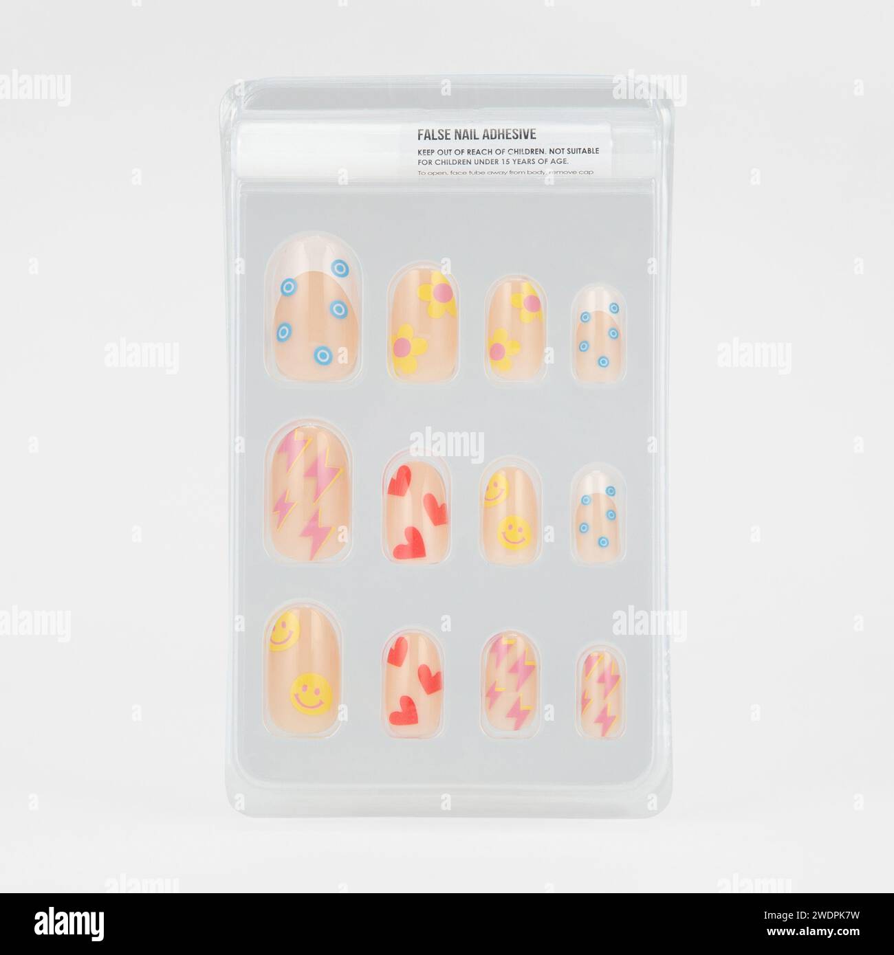 realistic set of colored false nails adhesive isolated on white ...