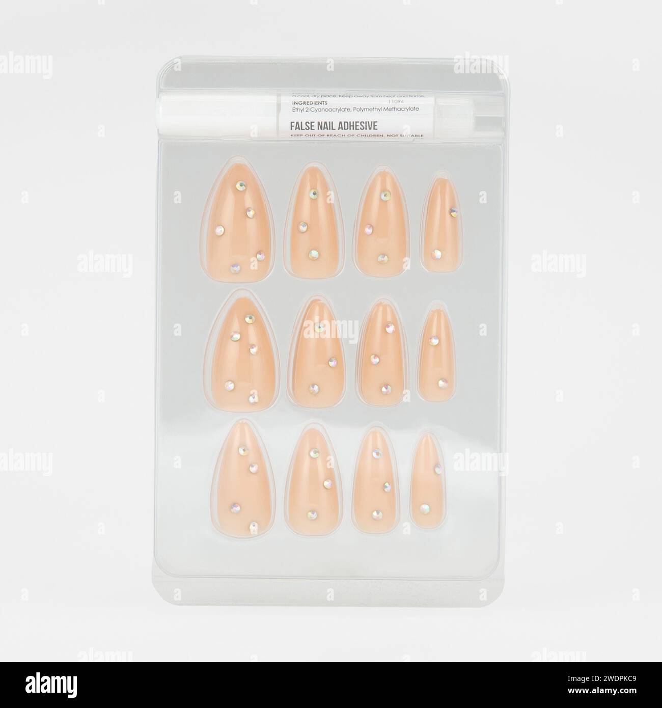 realistic set of colored false nails adhesive isolated on white ...