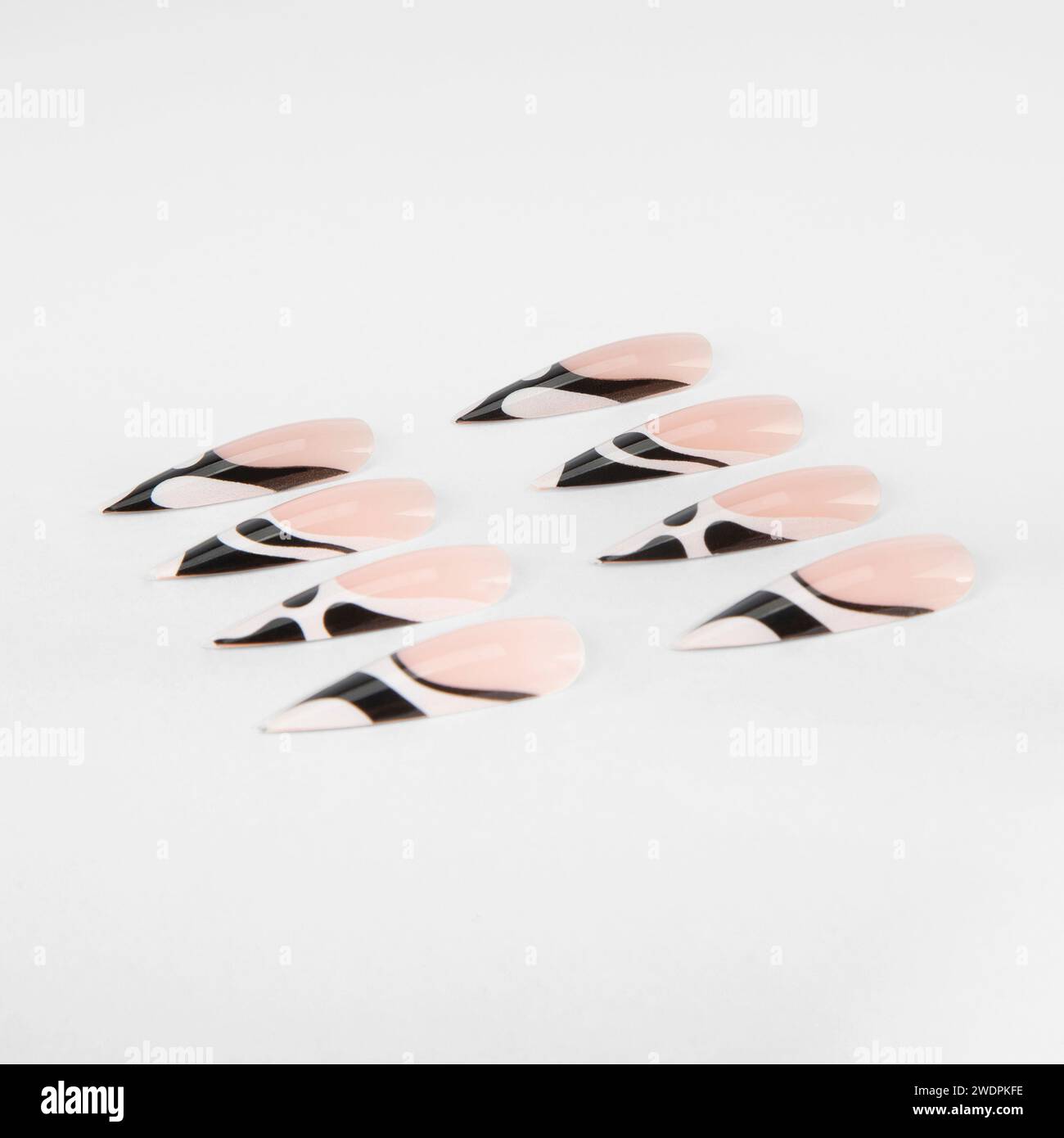 realistic set of colored false nails adhesive isolated on white ...