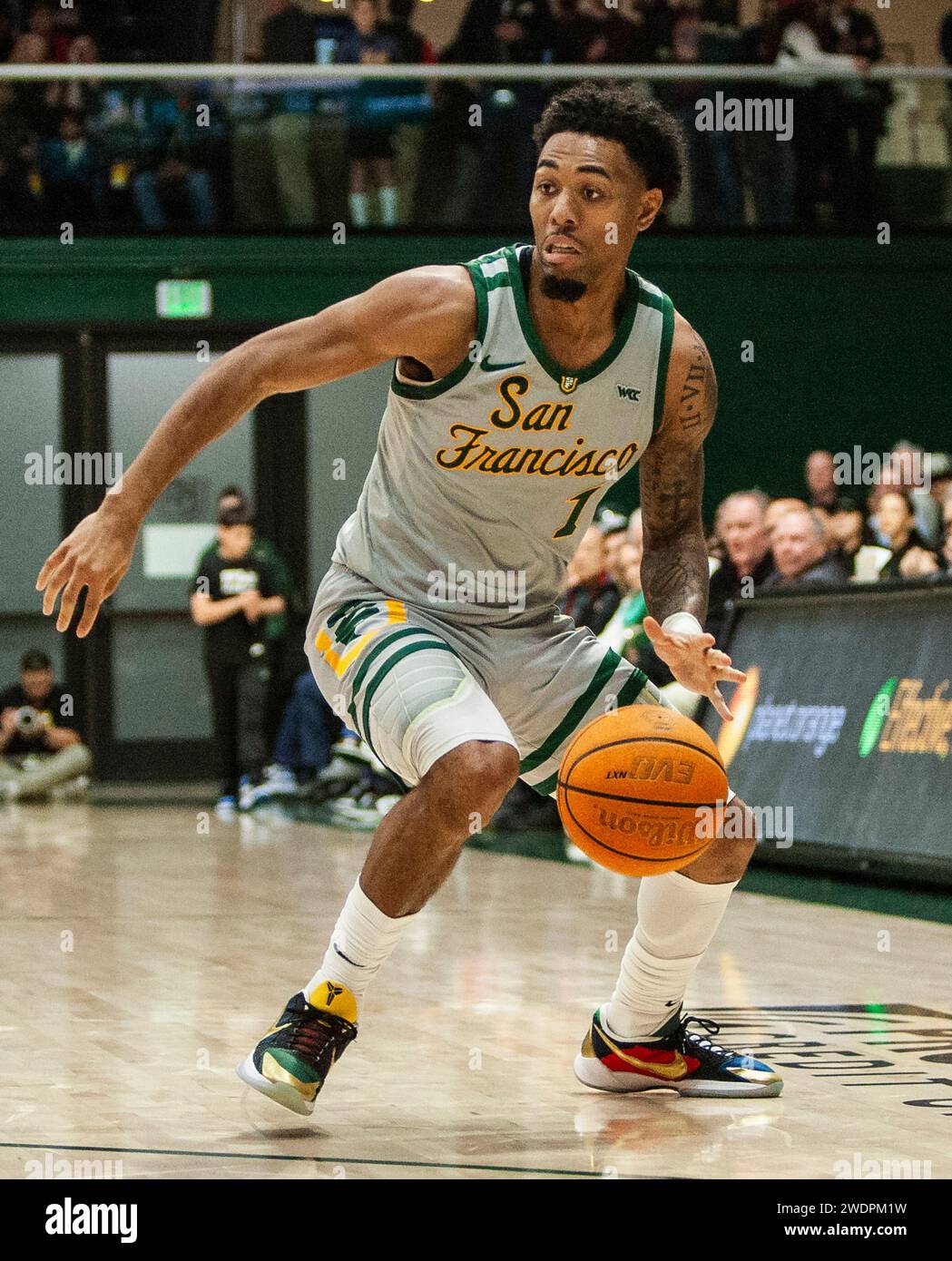 January 20 2024 San Francisco CA, U.S.A. San Francisco guard Malik Thomas (1)goes to the hoop ...