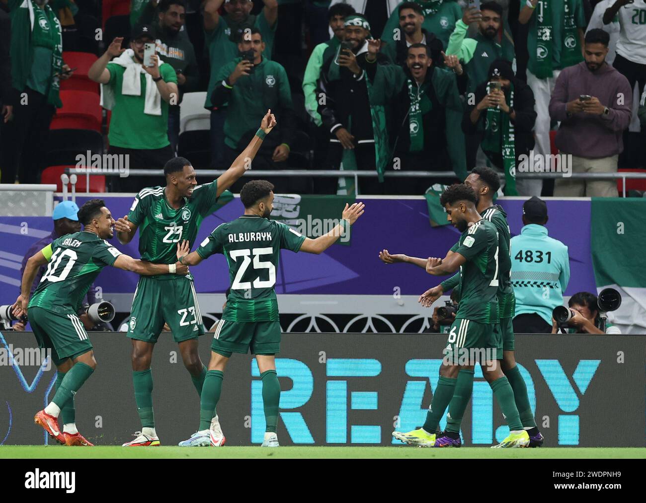 Doha, Qatar. 21st Jan, 2024. Mohammed Kanno (2nd L) of Saudi Arabia ...