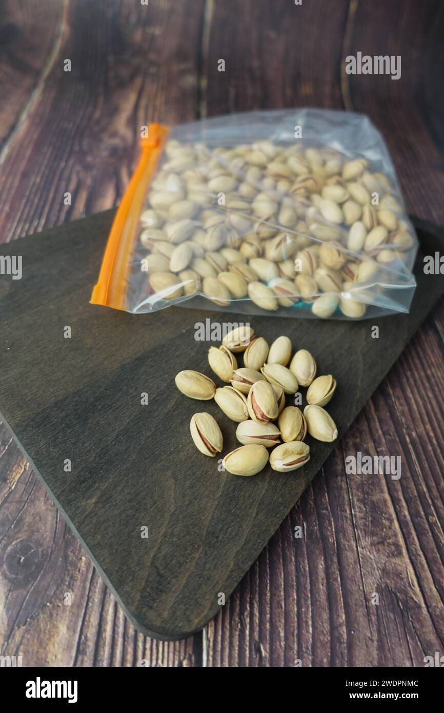 Packet of dry roasted nuts hi-res stock photography and images - Alamy