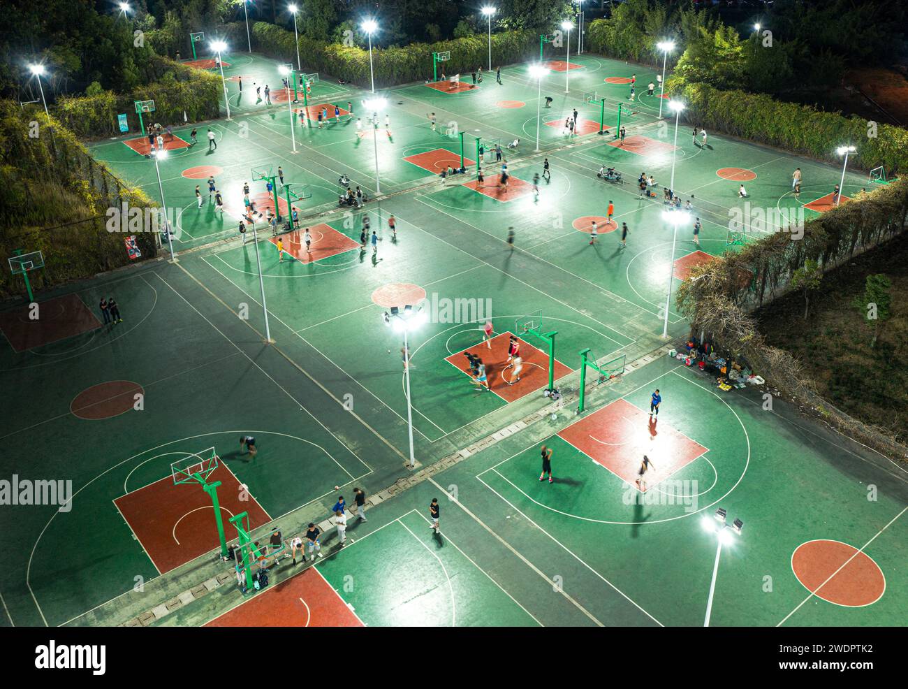 A university basketball court illuminated at night Stock Photo - Alamy