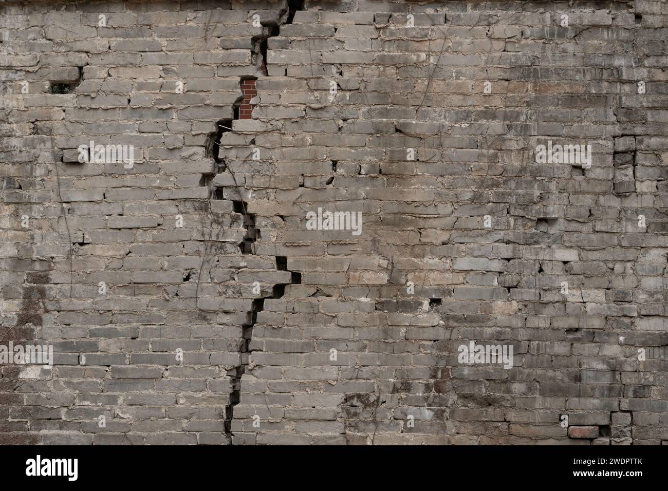 a dangerous wall with large cracks at horizontal composition Stock ...