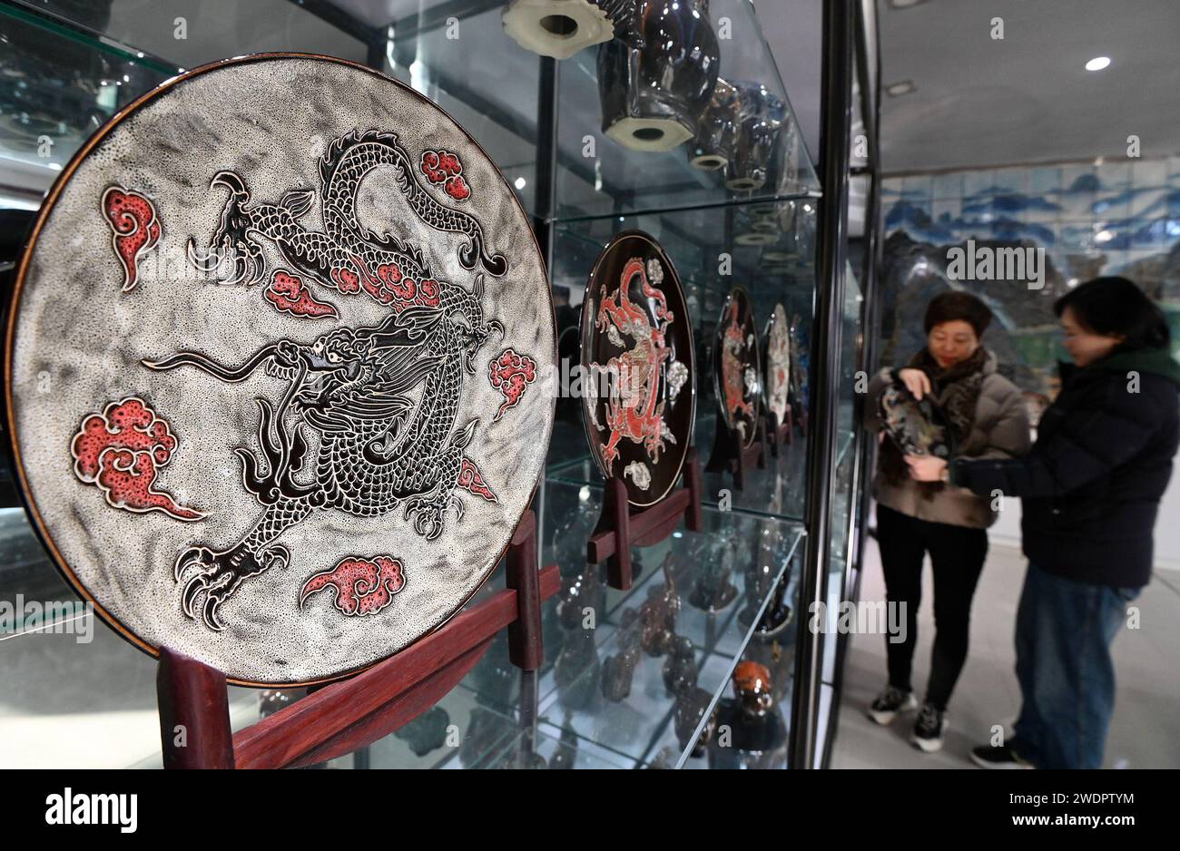 HANDAN, CHINA - JANUARY 22, 2024 - Citizens look at the Year of the ...