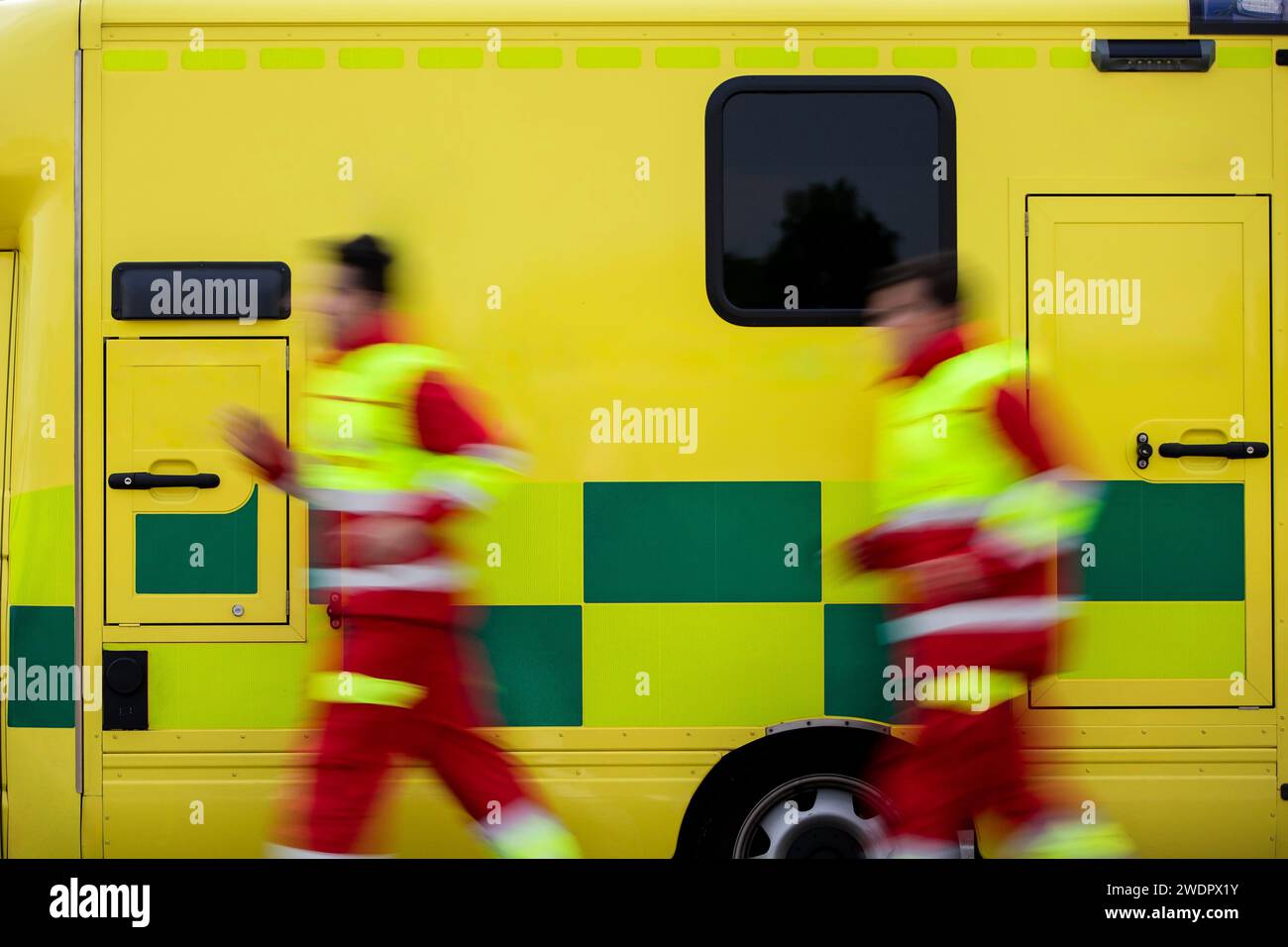 Team two paramedic running to ambulance car of emergency medical ...
