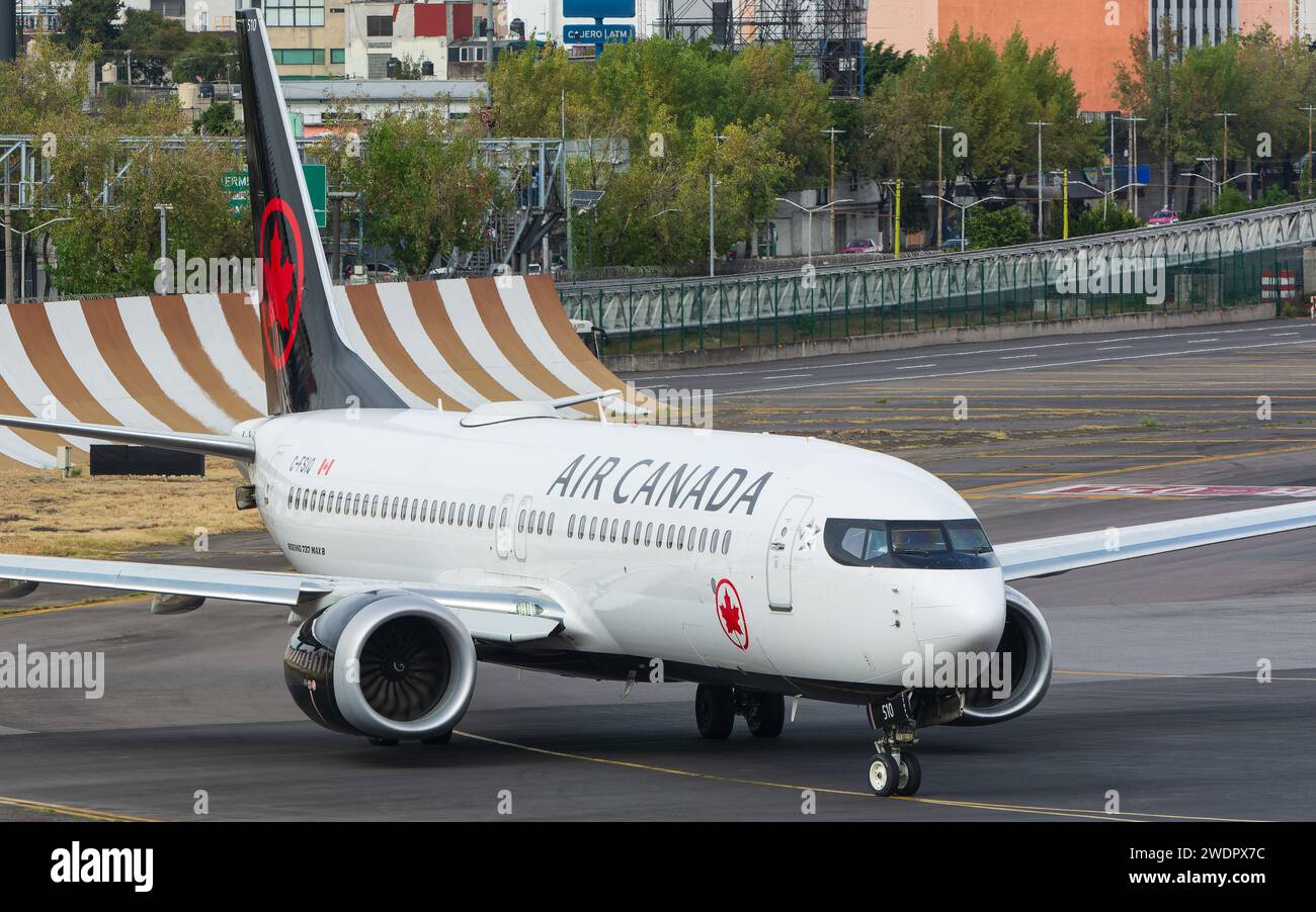 A closeup of an airplane on a runway ready to take off Stock Photo - Alamy