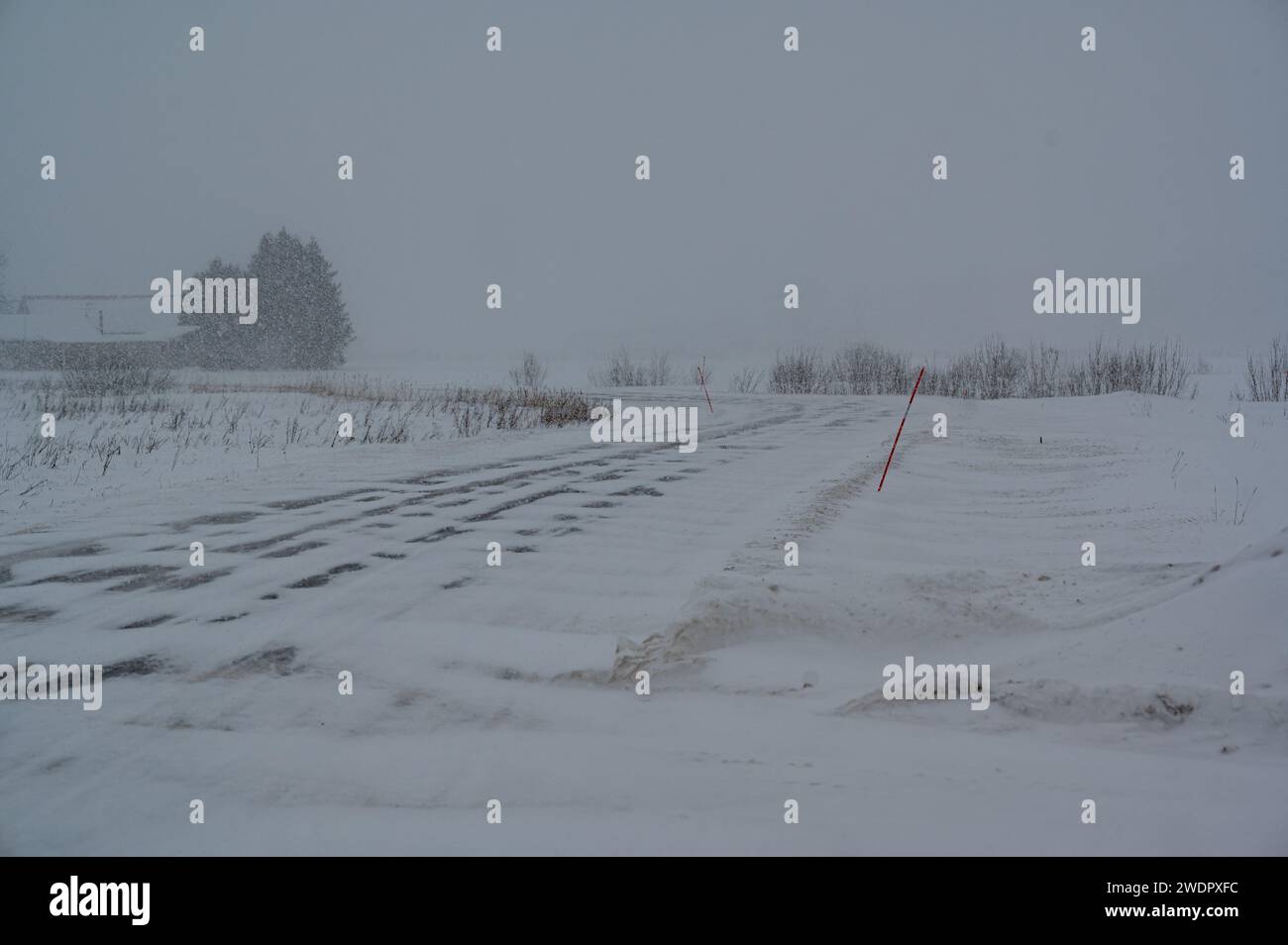 Snow blowing over road hi-res stock photography and images - Alamy