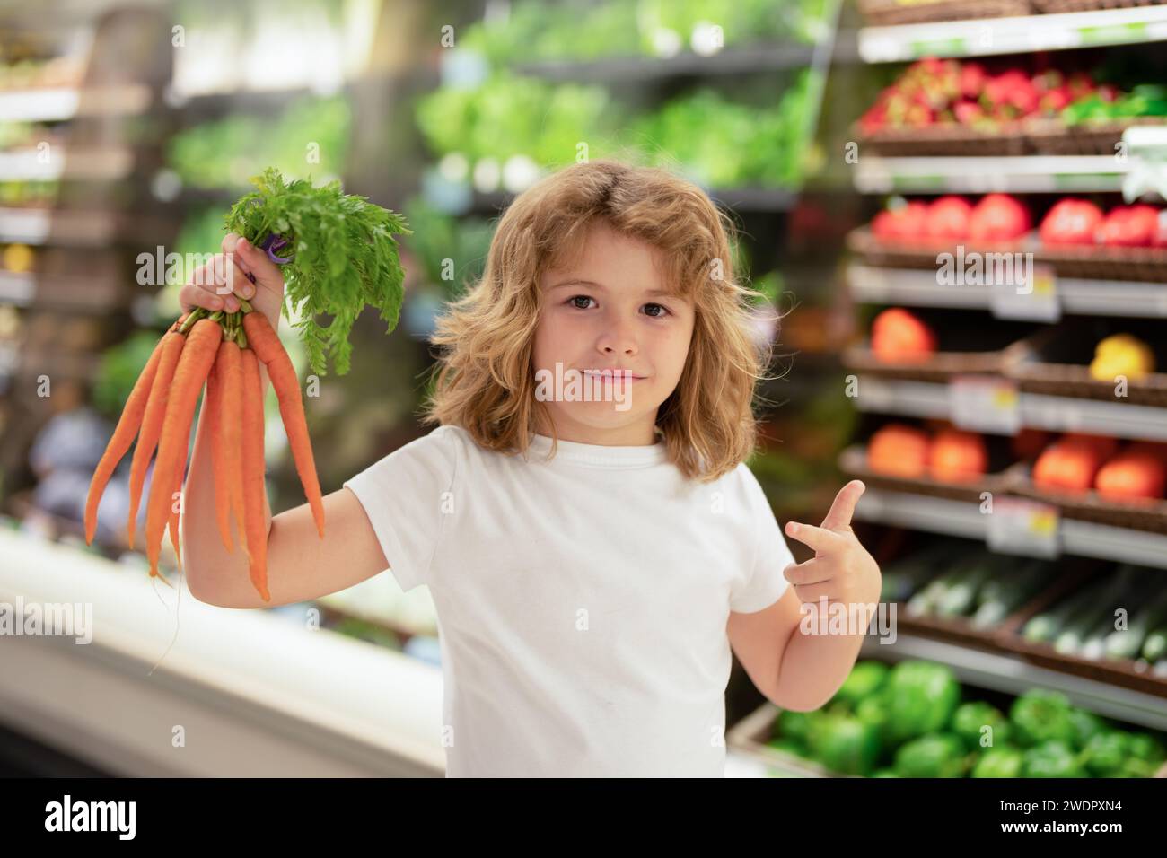 Child in food shop in supermarket store. Kids shopping in food ...
