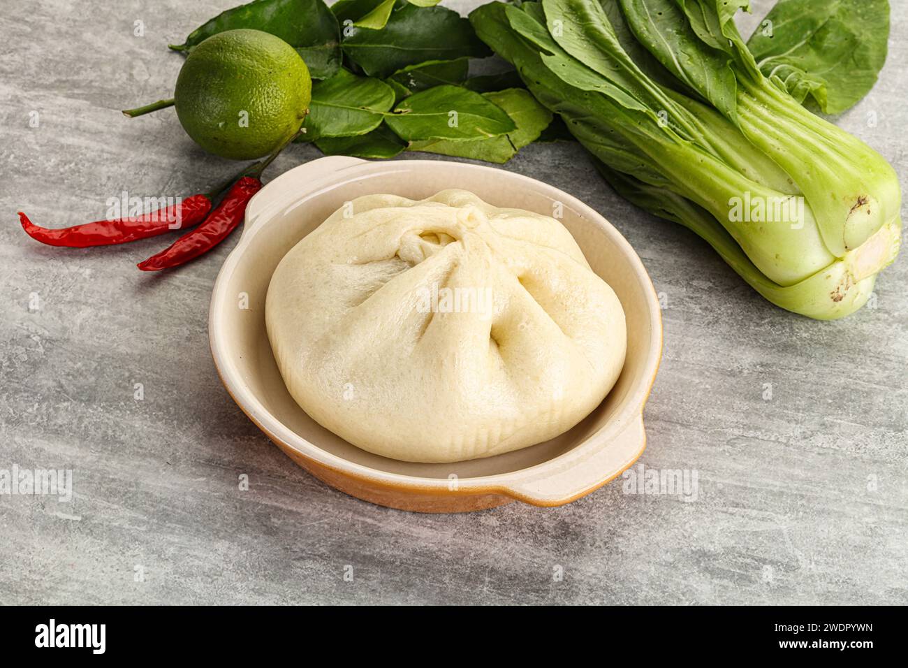 Chinese steamed bun Dim sum with meat Stock Photo - Alamy