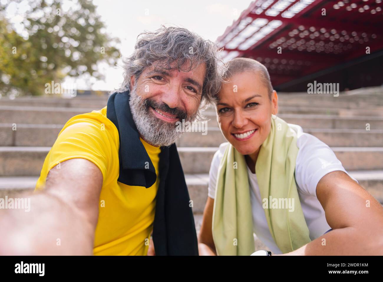 selfie of a senior man with his personal trainer Stock Photo - Alamy