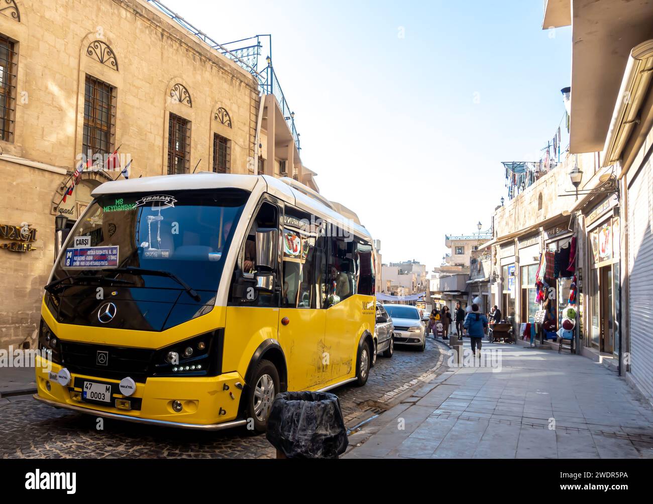 Public bus service in the streets of historic old city in Mardin Turkey ...