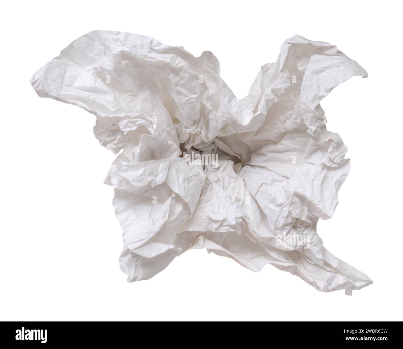 Single screwed or crumpled tissue paper or napkin in strange shape ...