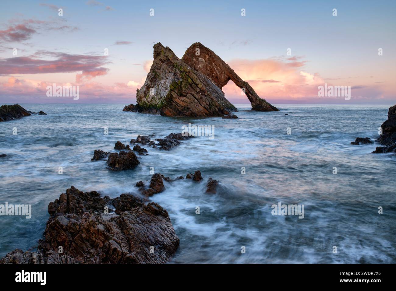 Bow Fiddle Rock at dusk in December. Portknockie, Morayshire, Scotland ...