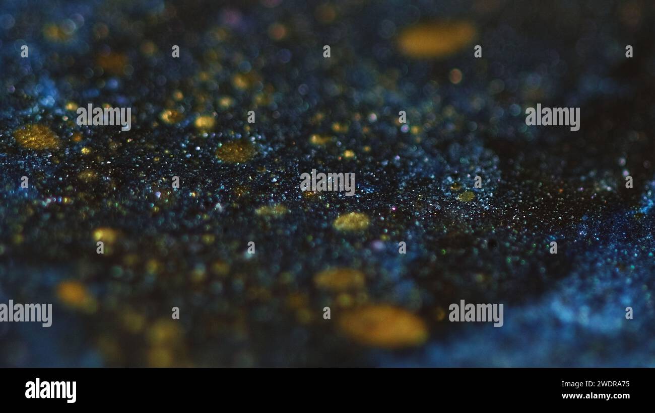 Wet glitter texture sparkling paint blue golden Stock Photo - Alamy
